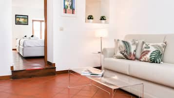 Apartamento, 2 quartos | Área de estar | TV de tela plana, Netflix, serviços de streaming