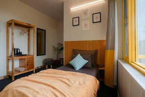 Quarto Individual Deluxe | Cortinas/cortinados opacos, Wi-fi grátis, roupa de cama fornecida