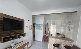 Apartamento Numero 2 | Área de estar | TV de tela plana 32 polegadas com canais digitais, smart TV, Netflix