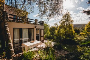 Suíte | Vista para o jardim