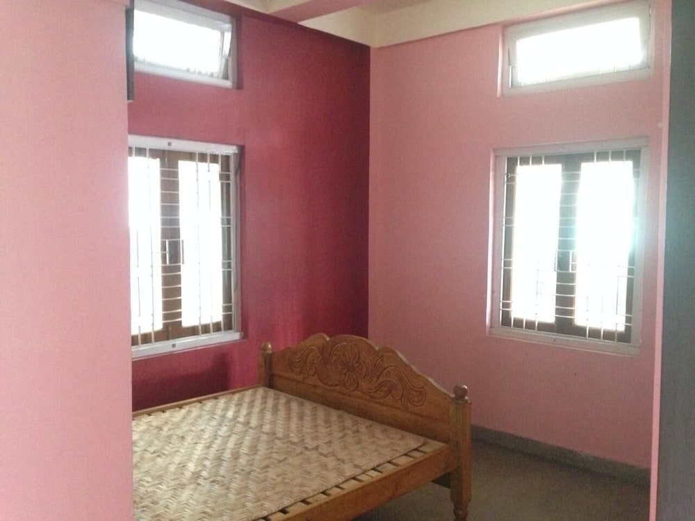 A Spacious Two Storey Residential Building Supporting A 3bhk 2 Bathroom Room - Guwahati