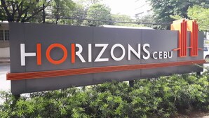Placa para Horizons Cebu, com design moderno e um logotipo com linhas verticais.