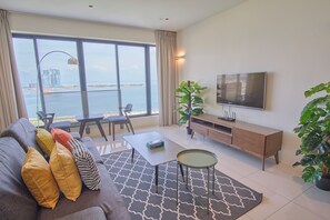 Apartamento standard (SG73) | Área de estar | TV de tela plana