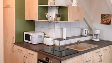 Apartamento conforto | Cozinha privada | Geladeira, micro-ondas, cooktop, torradeira