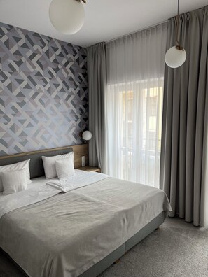 Apartamento Deluxe | Roupa hipoalergénica, cofre no quarto, com decoração personalizada