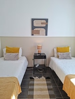 Quarto Twin Standard, casa de banho partilhada | 1 quarto, Wi-fi grátis, roupa de cama fornecida 