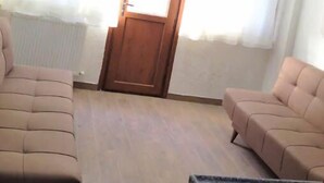 Apartamento, 2 quartos | Área de estar