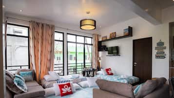Suíte estúdio família | 1 quarto, individualmente decorados, individualmente mobiliados