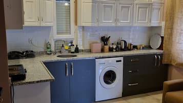 Suíte standard, banheiro privativo, vista para o jardim | Cozinha privada | Chaleira elétrica