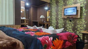 Quarto executivo, vista para a montanha | Roupas de cama premium, frigobar, escrivaninha