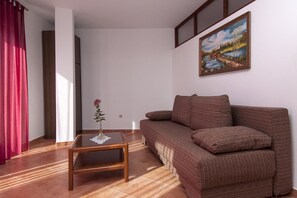 Apartamento, 1 cama de casal e sofá-cama | Sala de estar