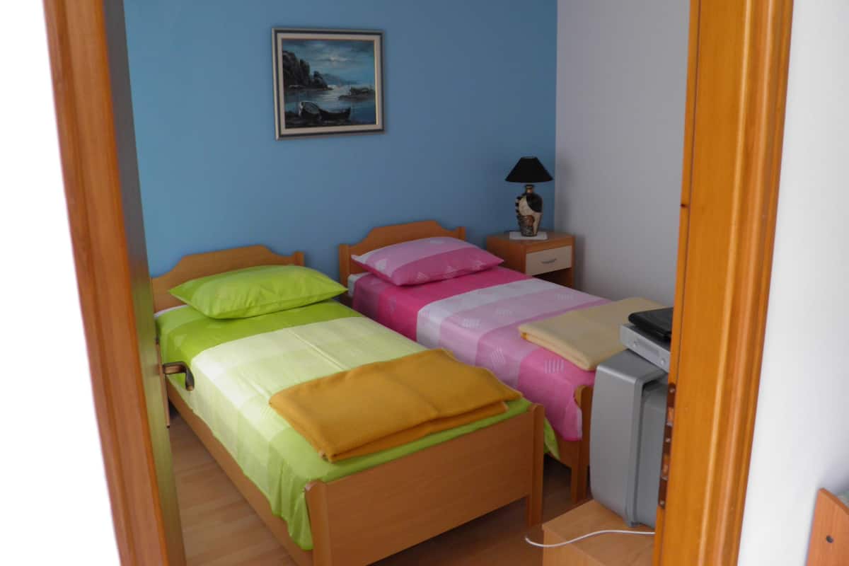 Apartamento, várias camas | Wi-fi grátis, roupa de cama fornecida