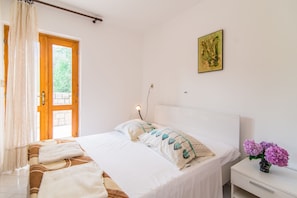 Apartamento, várias camas | 1 quarto, Wi-Fi de cortesia, roupa de cama