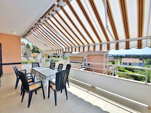 Apartamento, várias camas | Varanda