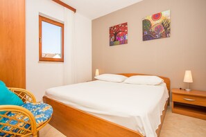 Apartamento, 2 camas de casal | Wi-Fi de cortesia, roupa de cama