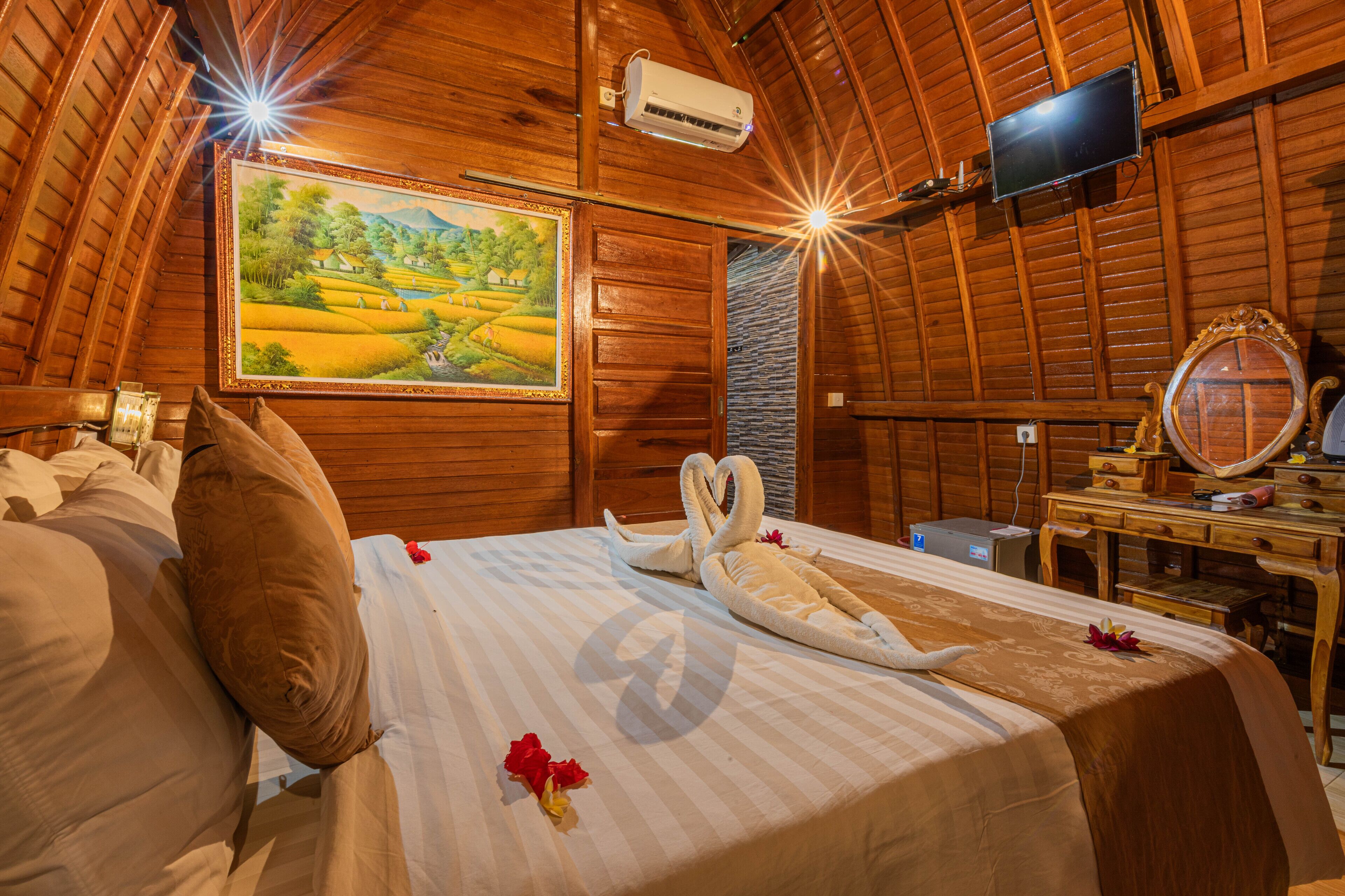Bangalô luxo, vista para o jardim | Frigobar, quartos à prova de som, Wi-Fi de cortesia, roupa de cama