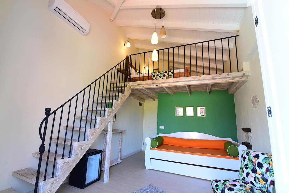 Quarto Familiar | Minibar, cortinas/cortinados opacos, quartos insonorizados