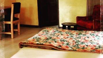 Quarto Deluxe | Roupa de cama fornecida