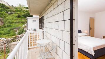 Apartamento, várias camas | Wi-Fi de cortesia, roupa de cama