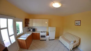Apartamento, v árias camas | Cozinha privada