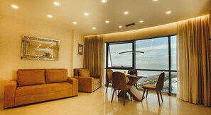 Suite-Estúdio Panorâmica | Roupa de alta qualidade, com decoração personalizada 