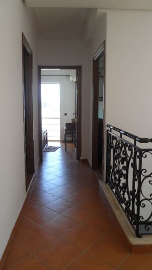 Duplex | Área de estar | TV de tela plana