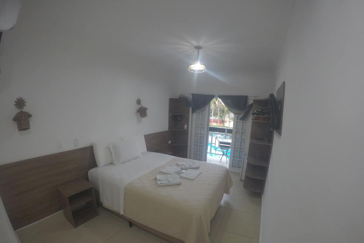 Quarto casal premium, vista para a praia | Frigobar, cofres nos quartos, cortinas blackout