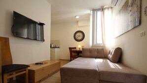 Apartamento Standard, 1 quarto | Sala de estar