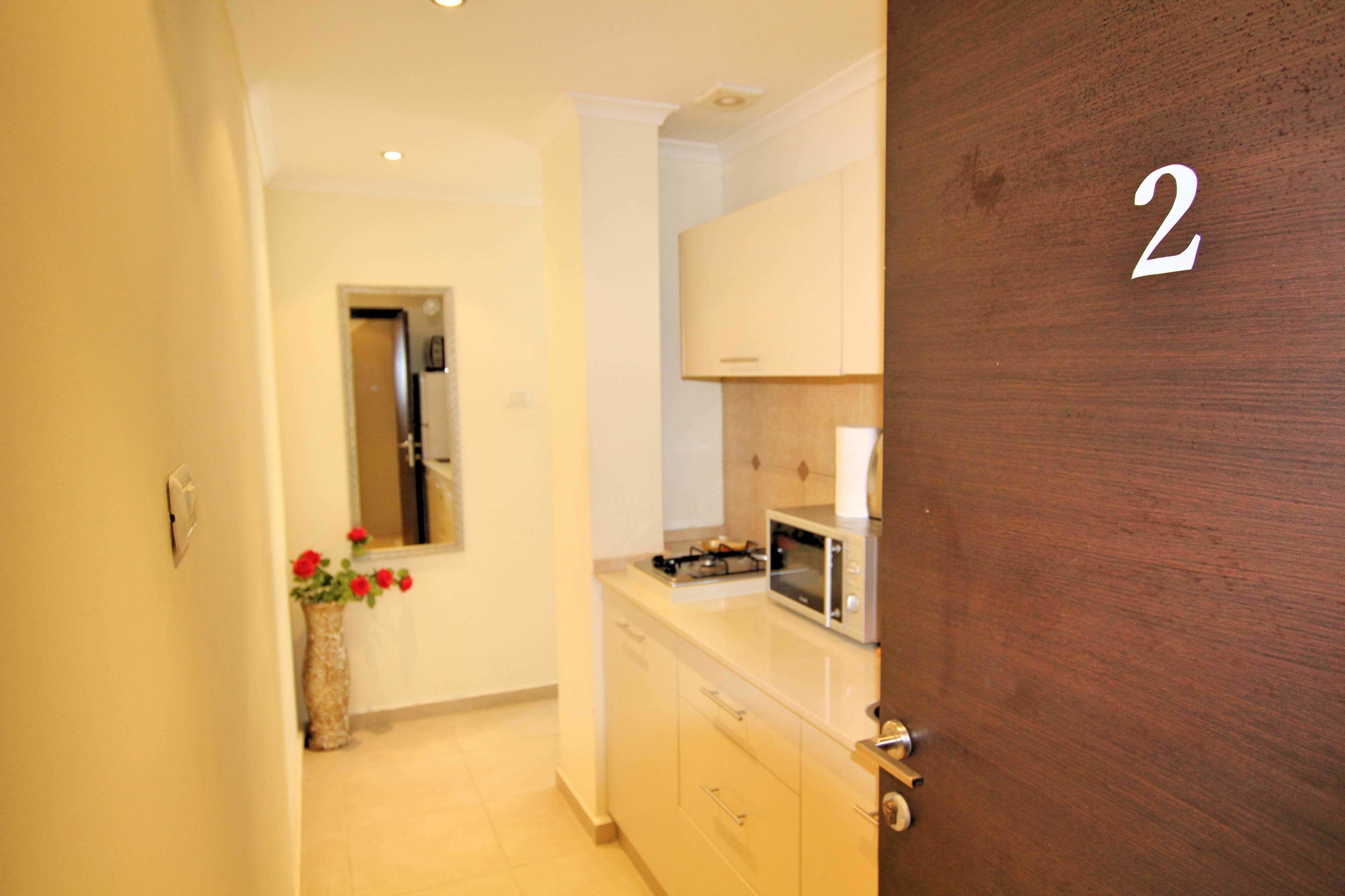 Apartamento clássico | Cozinha privada | Geladeira, fogão, cooktop, cafeteira/chaleira