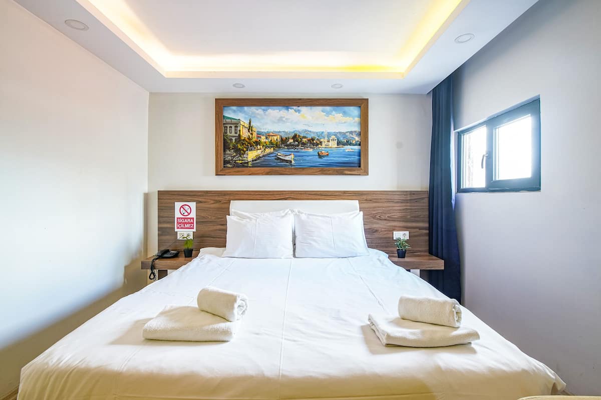 Suite Elite, 1 cama queen-size, Vista para a cidade | Cofre no quarto, com decoração personalizada