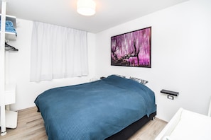 Apartamento, 4 quartos | 4 quartos, cortinas blackout, Wi-Fi de cortesia, roupa de cama