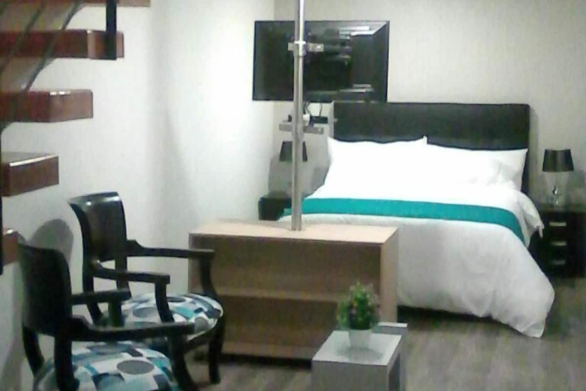 Duplex | Cortinas blackout, quartos à prova de som, ferros/tábuas de passar roupa