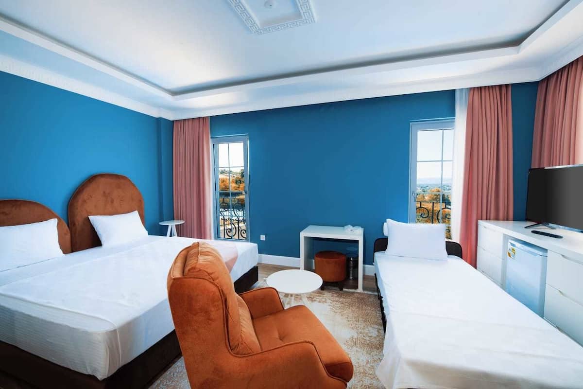 Quarto standard | Roupas de cama premium, escrivaninha, camas extras/dobráveis (sobretaxa)