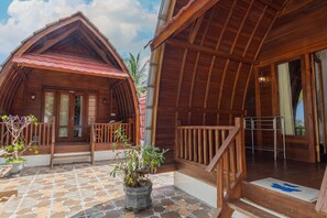 Quarto Duplo Deluxe, vista para o jardim | Terraço/pátio interior