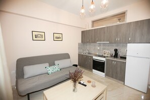 Apartamento, 1 quarto (#2) | Cozinha privada | Geladeira, fogão, cooktop, lava-louças