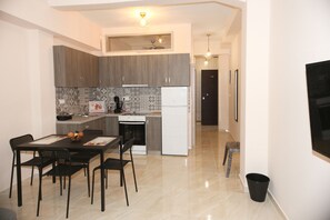 Apartamento conforto, 1 quarto (#3) | Cozinha privada | Geladeira, fogão, cooktop, lava-louças