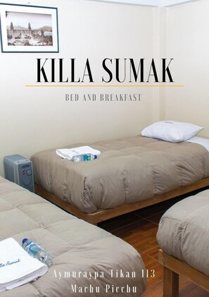 Cofres nos quartos, cortinas blackout, Wi-Fi de cortesia, roupa de cama