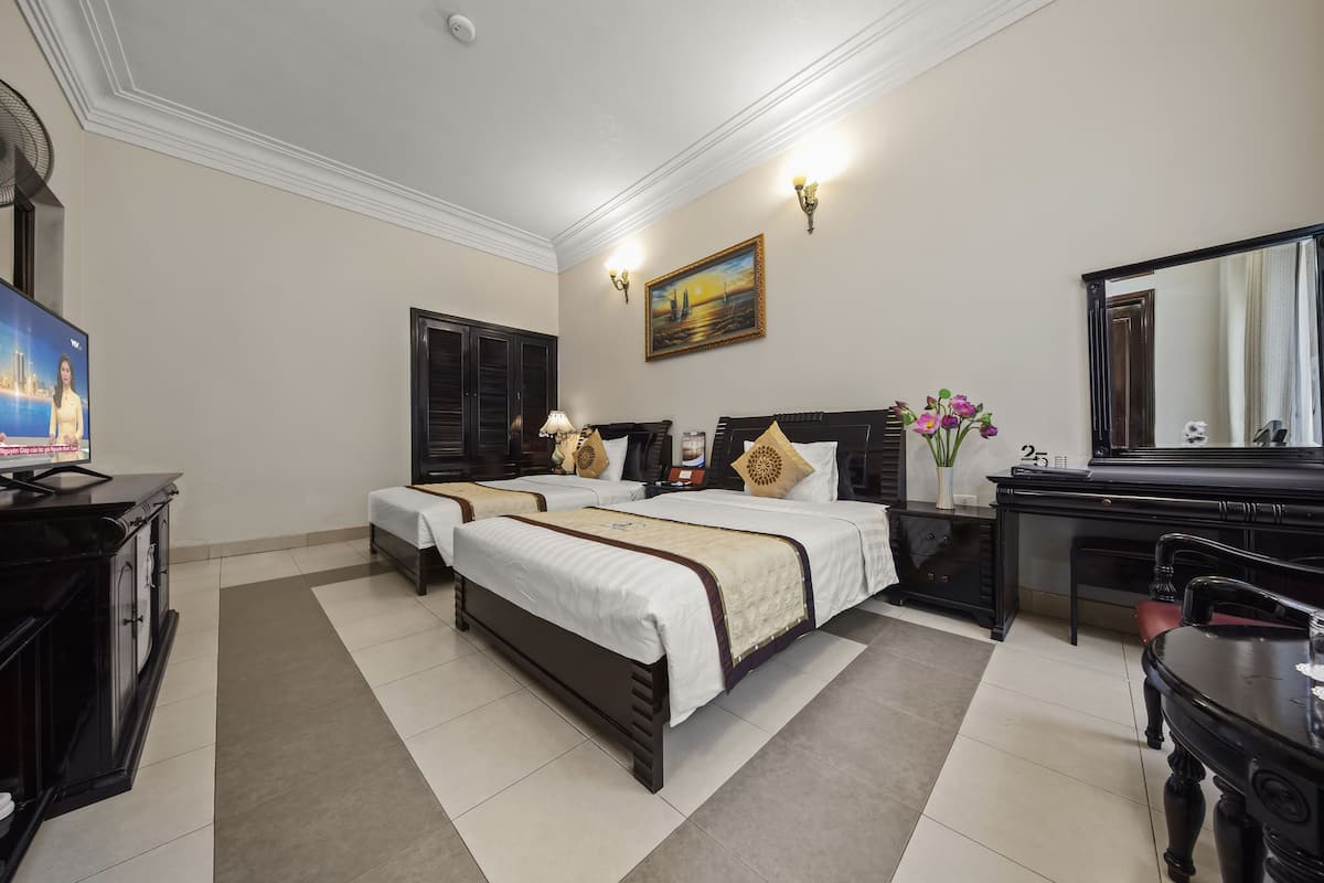 Quarto duplo, vista para o jardim | Frigobar, cofres nos quartos, escrivaninha, cortinas blackout