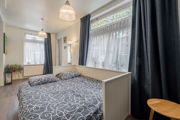 Apartamento Cidade | Sala de estar | TV de ecrã plano