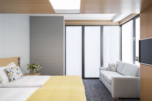 Quartos à prova de som, Wi-Fi de cortesia, roupa de cama