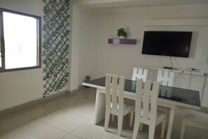Apartamento urbano | Opções para refeição no quarto