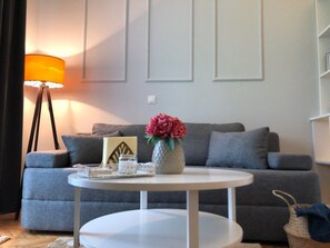 Apartamento conforto | Área de estar | TV de tela plana