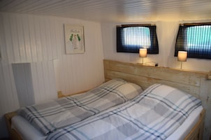 Quartos à prova de som, Wi-Fi de cortesia, roupa de cama