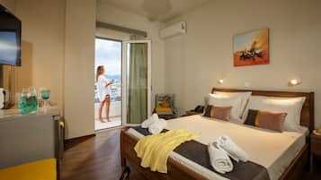 Quarto Duplo ou Twin | Minibar, ferro/tábua de engomar, Wi-fi grátis, roupa de cama fornecida