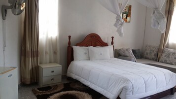 Suíte executiva | Roupas de cama premium, escrivaninha, espaço de trabalho para notebook