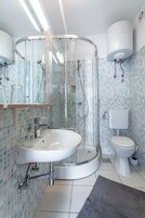 Apartamento (A1) | Banheiro | Chuveiro 