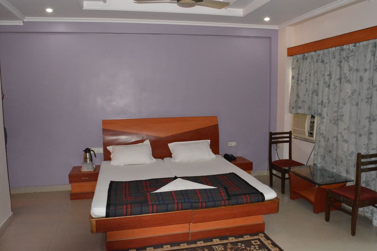 Quarto standard | Sala de estar | Lareira