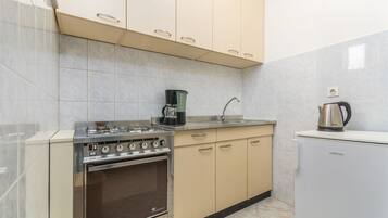 Cozinha privada | Geladeira, micro-ondas, fogão, cooktop