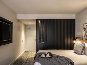 Quarto Deluxe, 1 cama king-size | Minibar, cofre no quarto, secretária, quartos insonorizados 