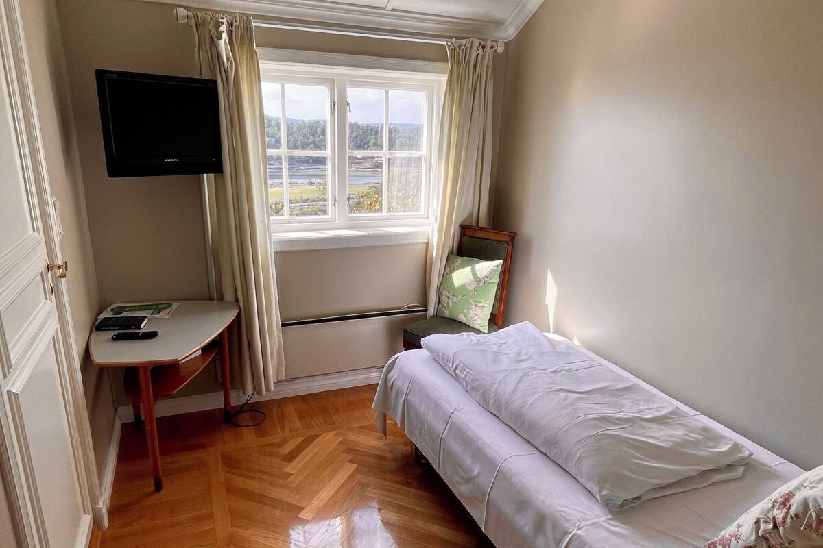 Quarto Individual Básico | Vista para a praia ou o mar